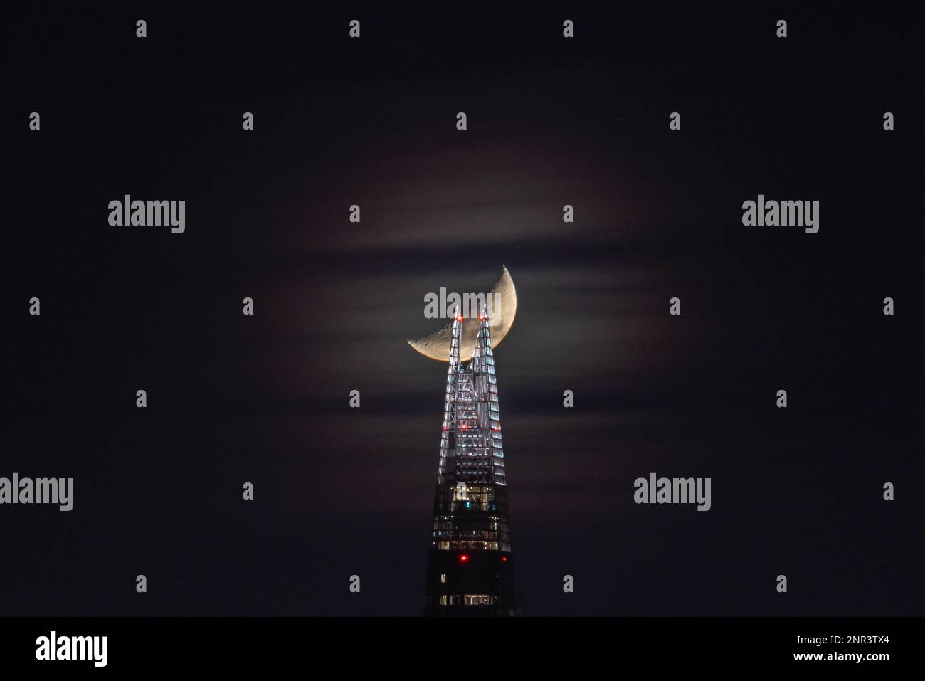 London, UK. 27th February 2023. UK Weather: Moonset over The Shard ...