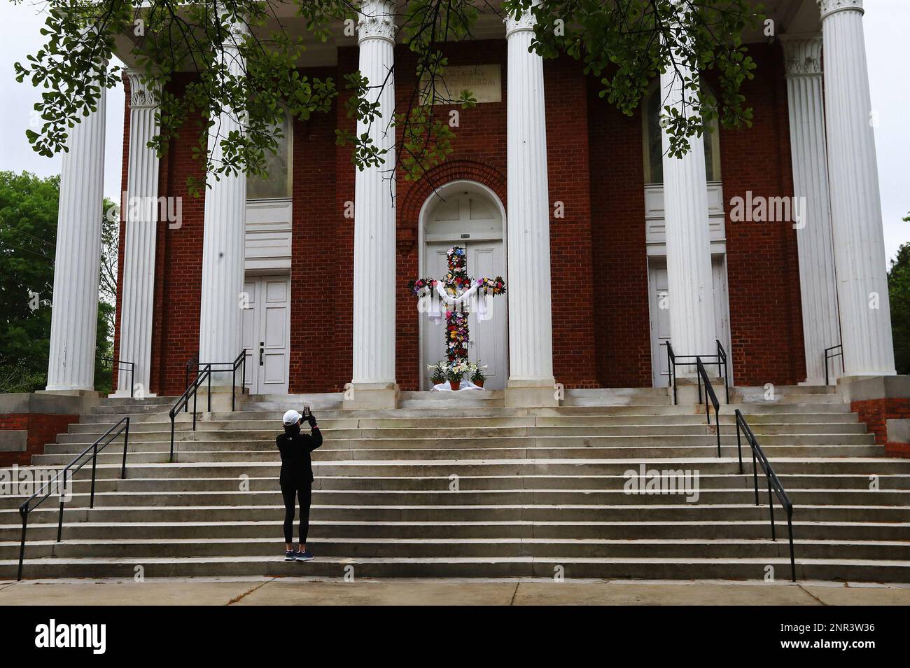 The doors are closed and the steps are empty as Beth Haney pauses to ...