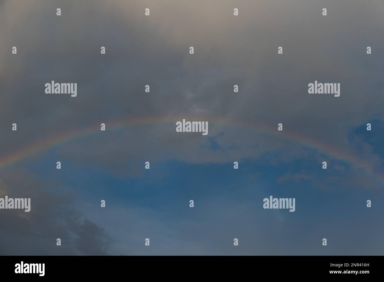 Rainbow colours in the sky Stock Photo - Alamy