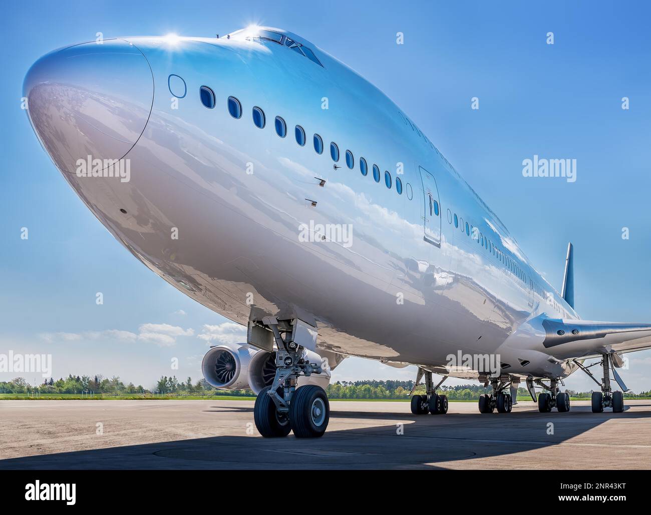 airliner on a runway ready for take off Stock Photo - Alamy