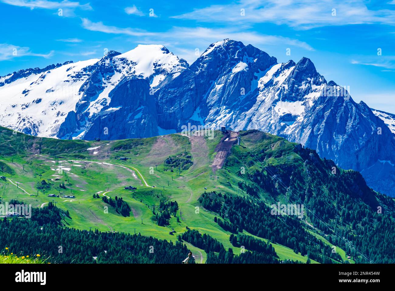 Mountain landscape of Italian Dolomites covered with snow with the hill ...