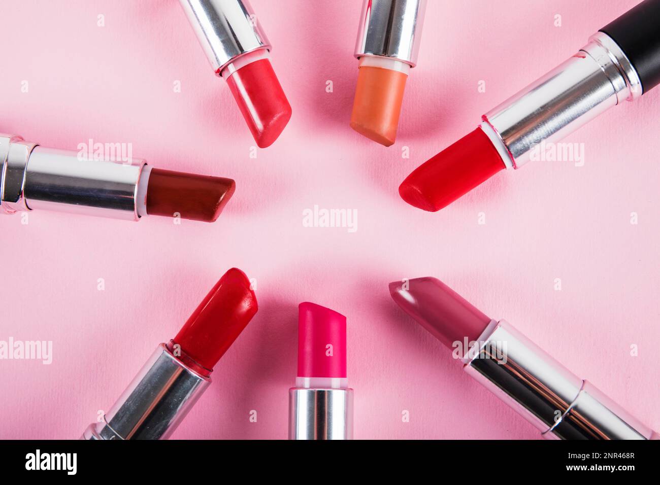 collection various colorful lipsticks pink surface. Beautiful photo ...