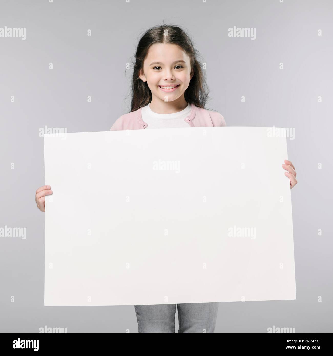 girl with empty poster studio Stock Photo - Alamy