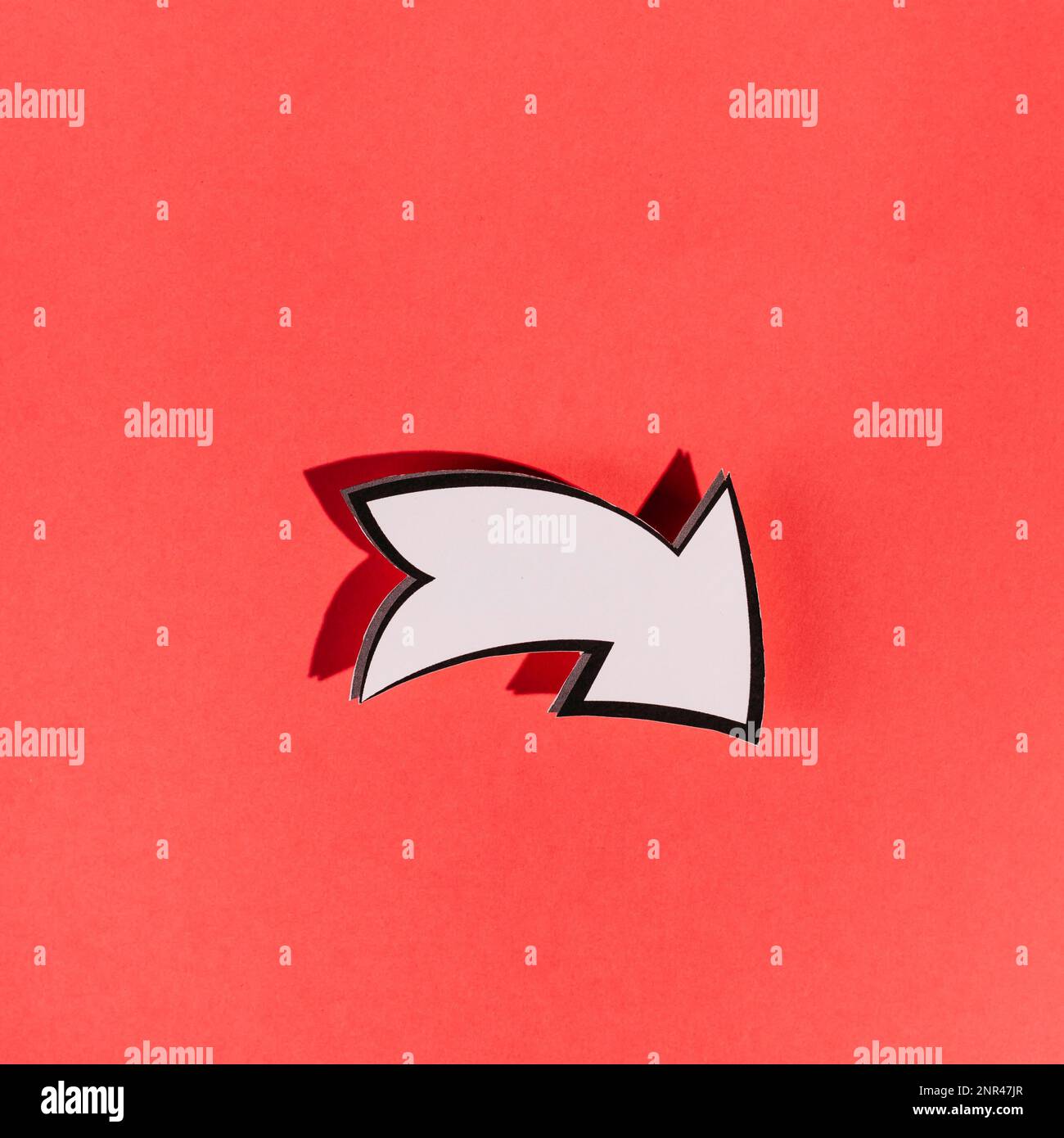 white directional arrow red background Stock Photo - Alamy