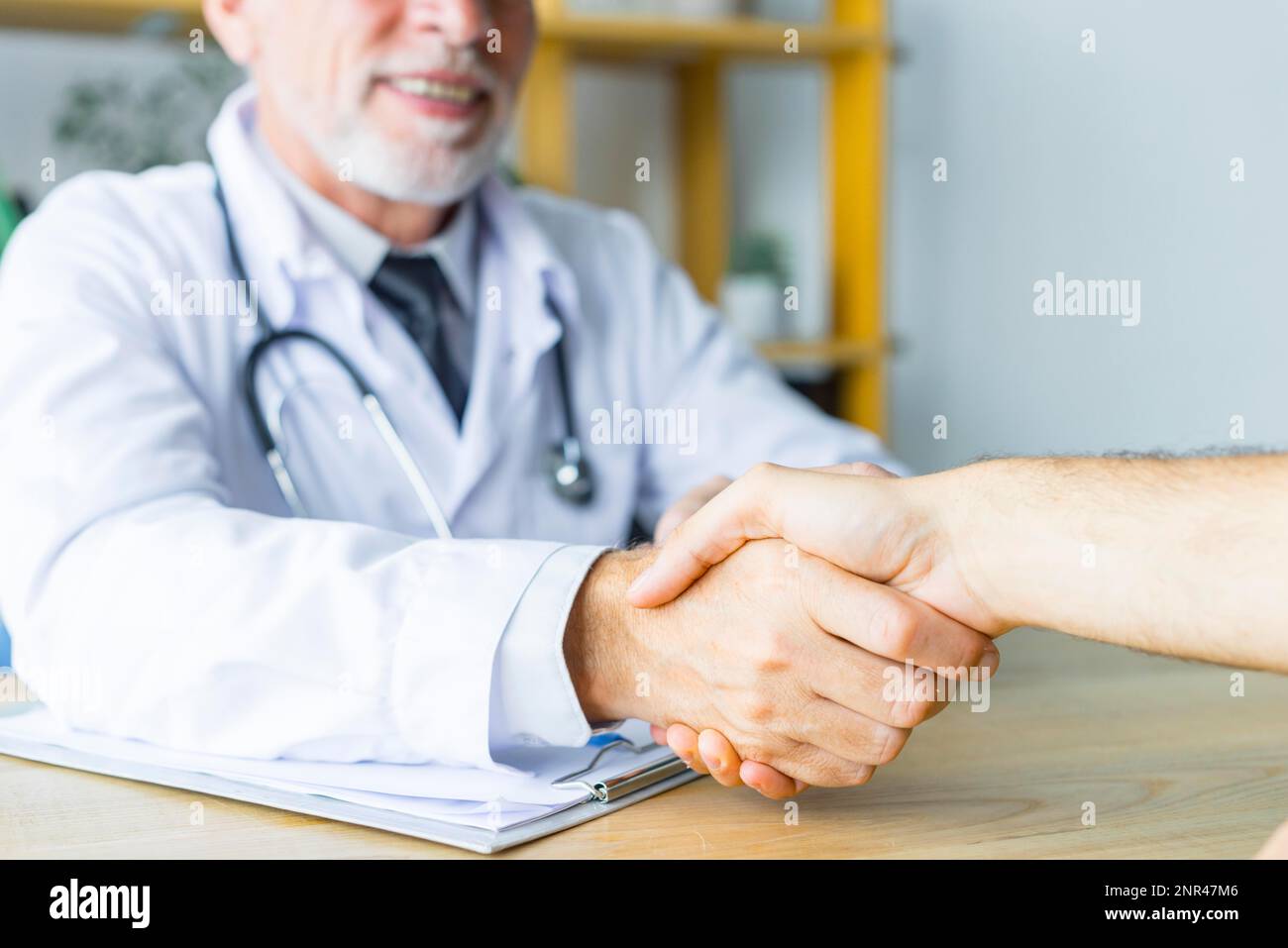Shaking hand patient hi-res stock photography and images - Alamy