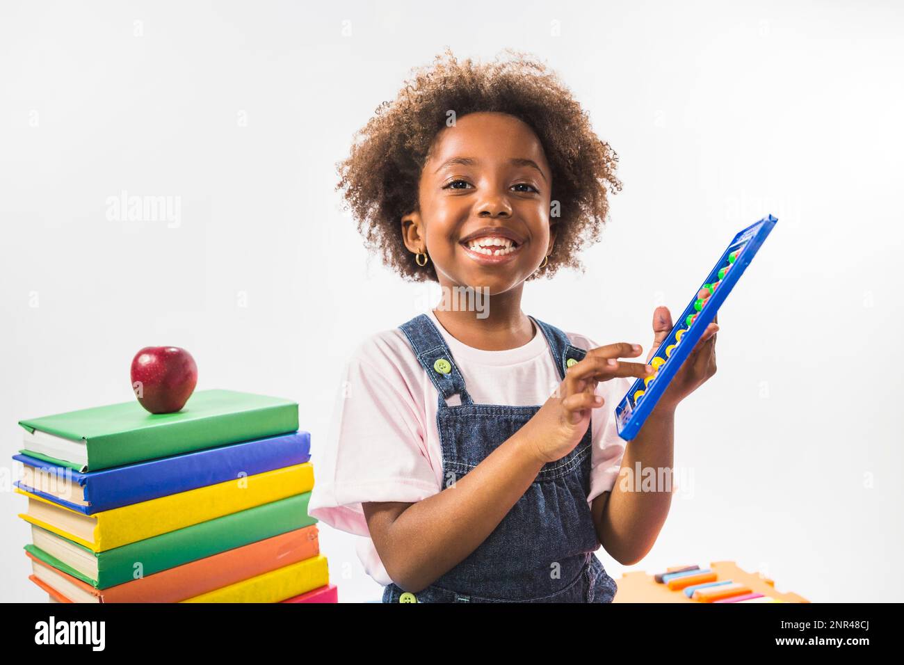 Child with abacus studio Stock Photo - Alamy