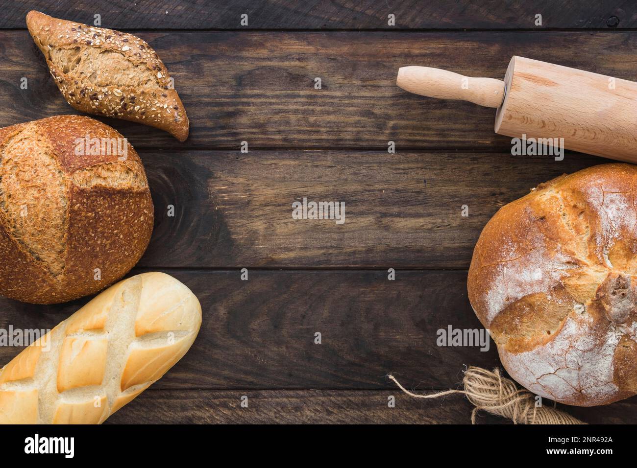 Bread near rolling pin thread Stock Photo - Alamy