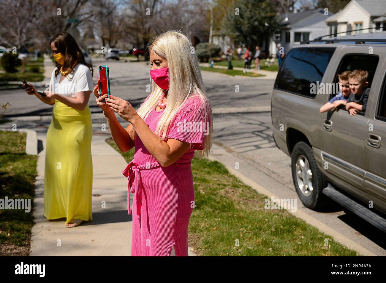 In this Saturday, April 4, 2020 photo, friends and family members ...