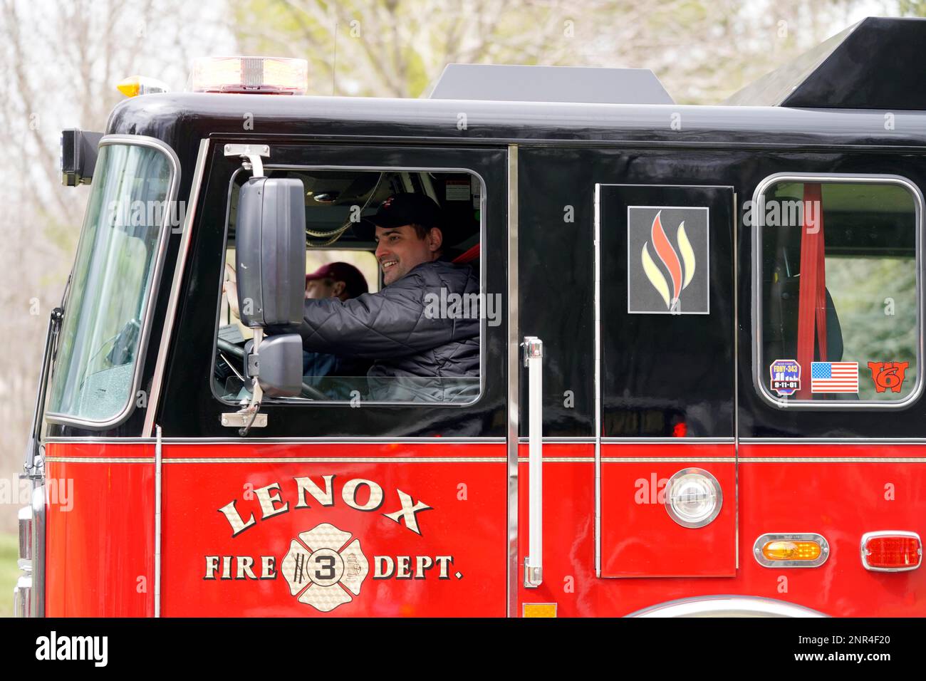 A birthday parade of firetrucks for David Rimmler, age 9, passed by his ...