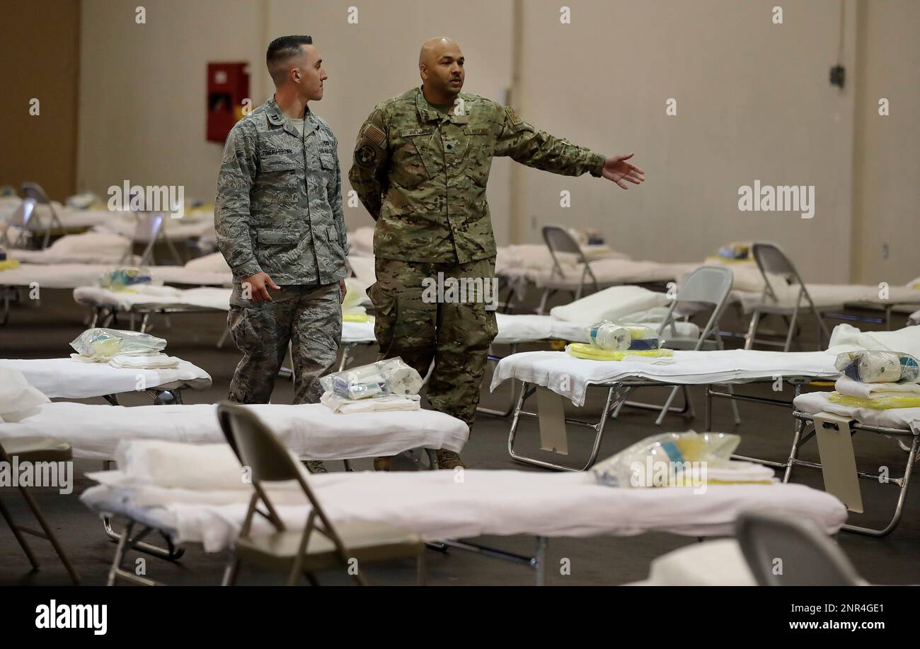 Lt. Col Shane Patty, right, gestures while speaking to Captain Torrance ...
