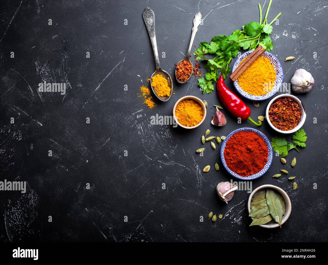 Indian food cooking background. Traditional Indian spices and ...