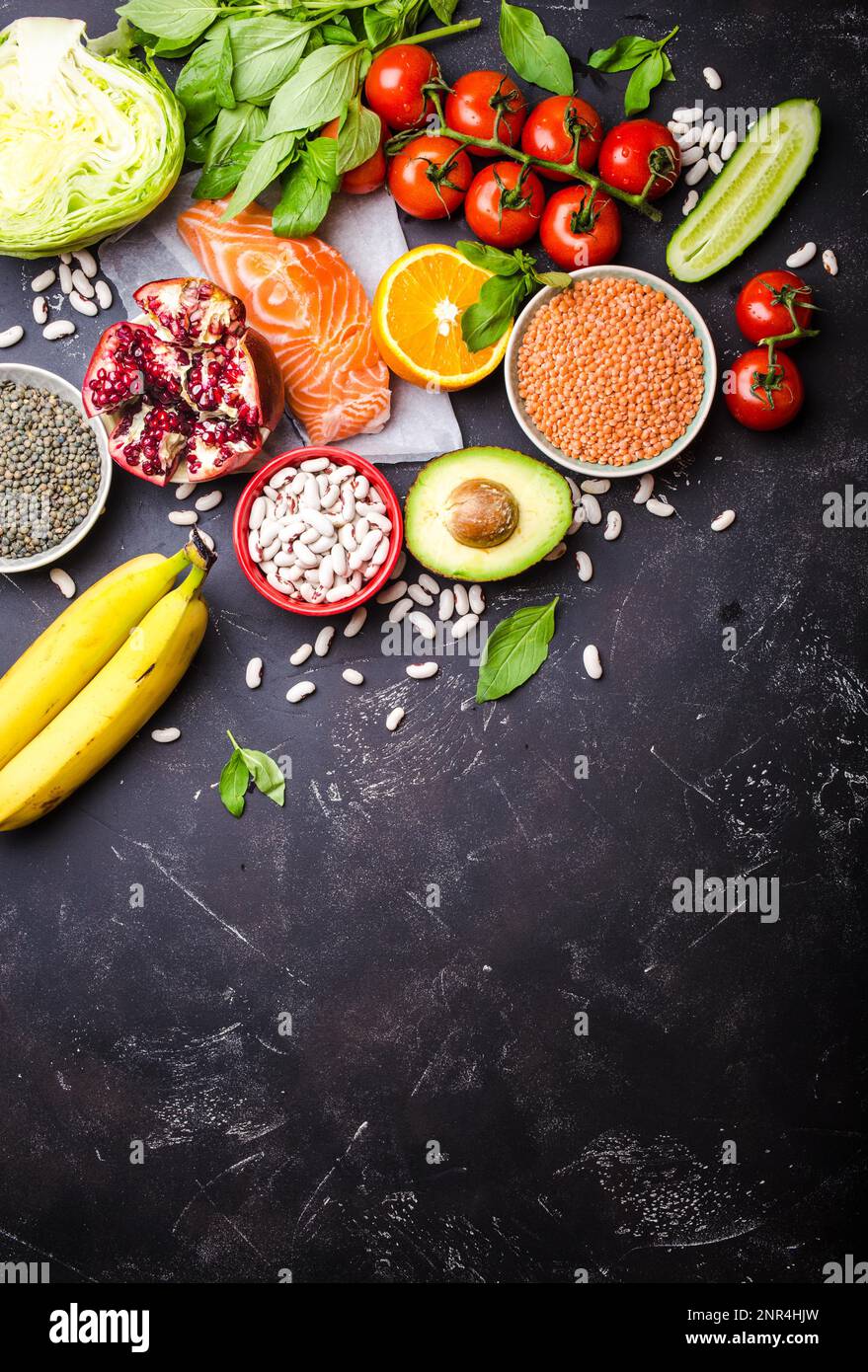 Top view of healthy diet food ingredients: fish salmon, vegetables ...