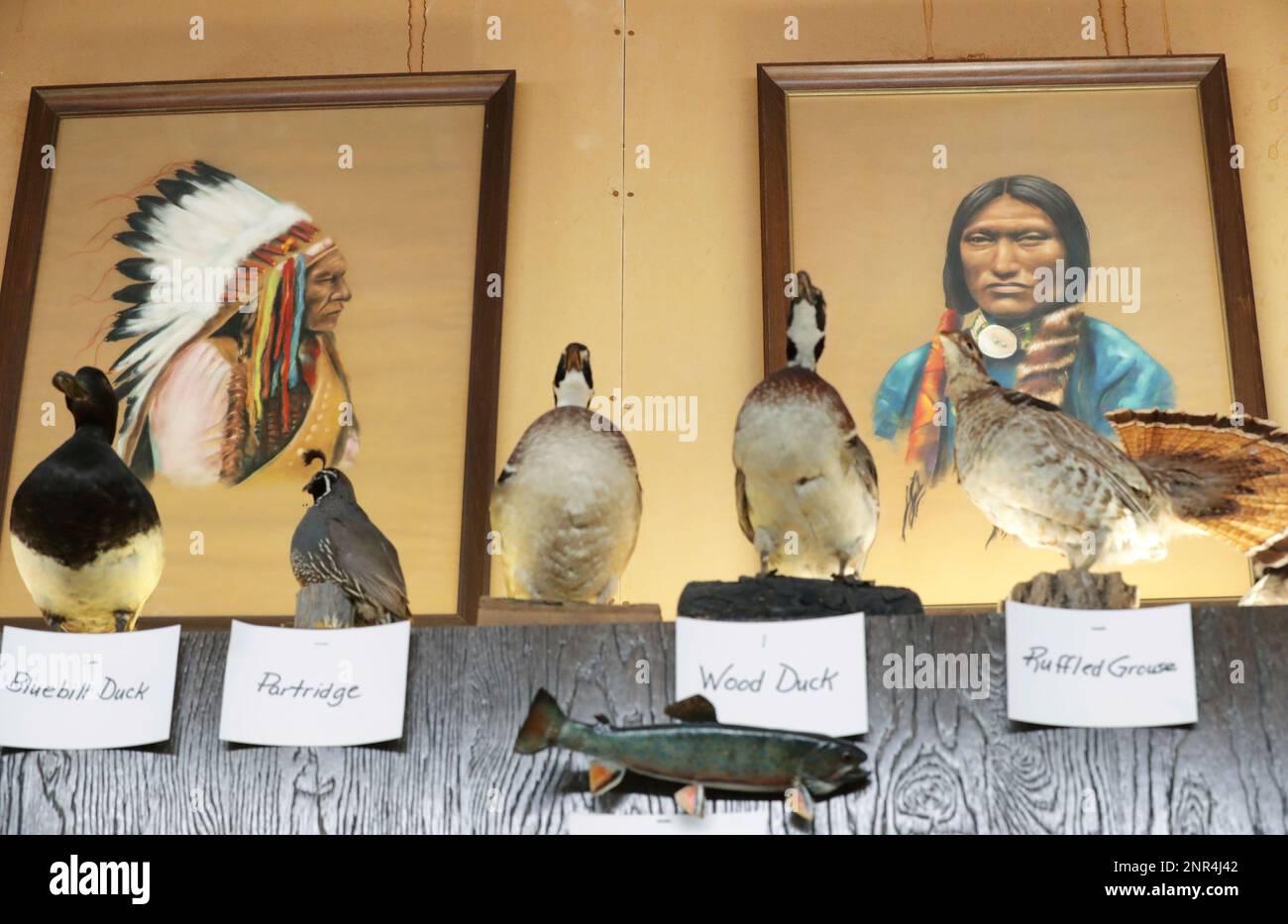In this Thursday, March 26, 2020 photo, Native American artwork mixes ...