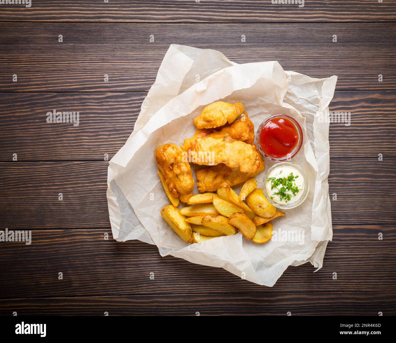 British national traditional fast food fish and chips with assorted ...