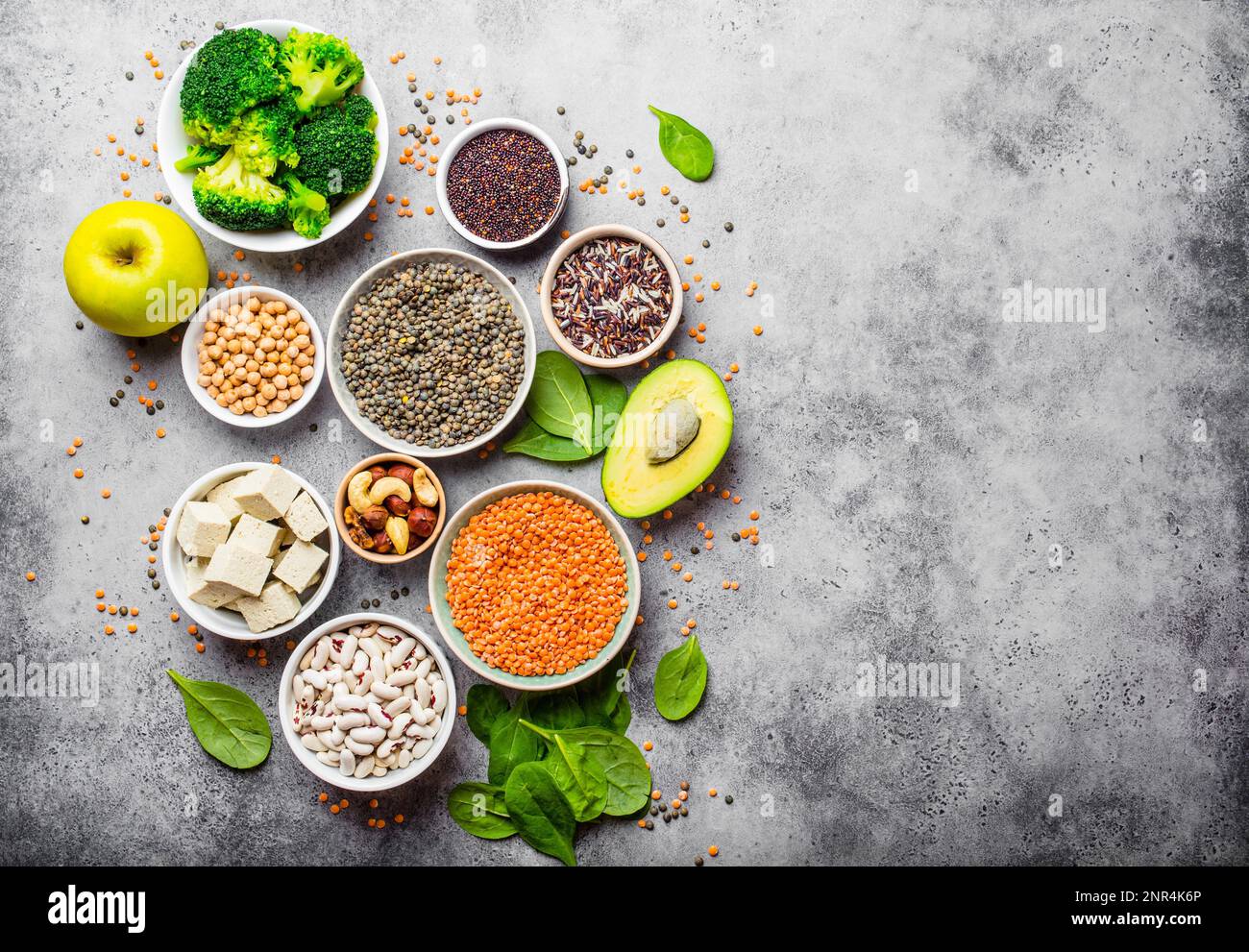 Variety of nutrient-rich food for vegans with copy space: beans ...