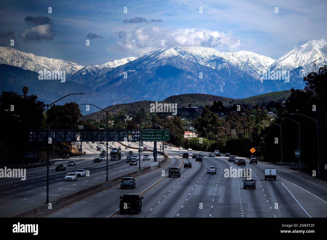 Drivers along the north bound 57 Freeway have a snow-capped view in ...