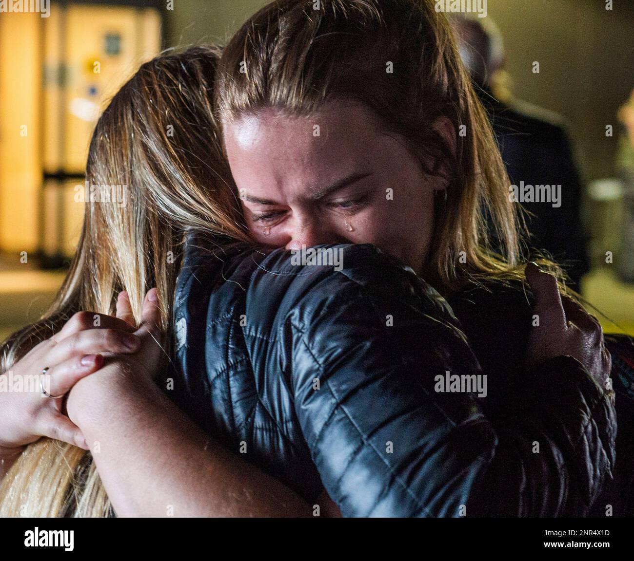 Sister Halle Ross hugs her mother, Misty Ross as she returns from her ...
