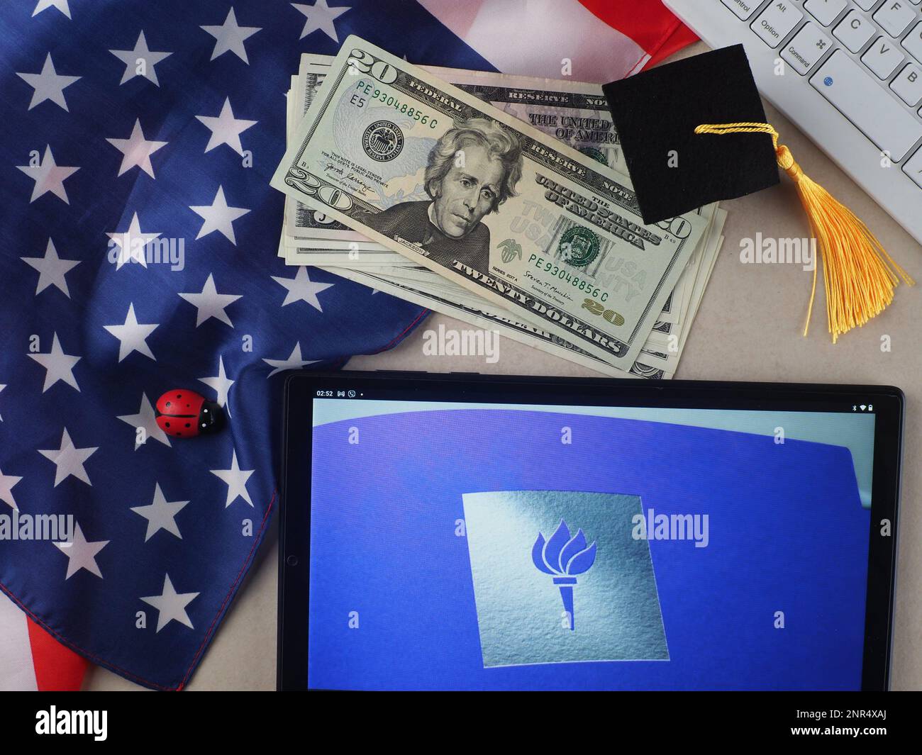 IIn this photo illustration, New York University (NYU) logo seen ...