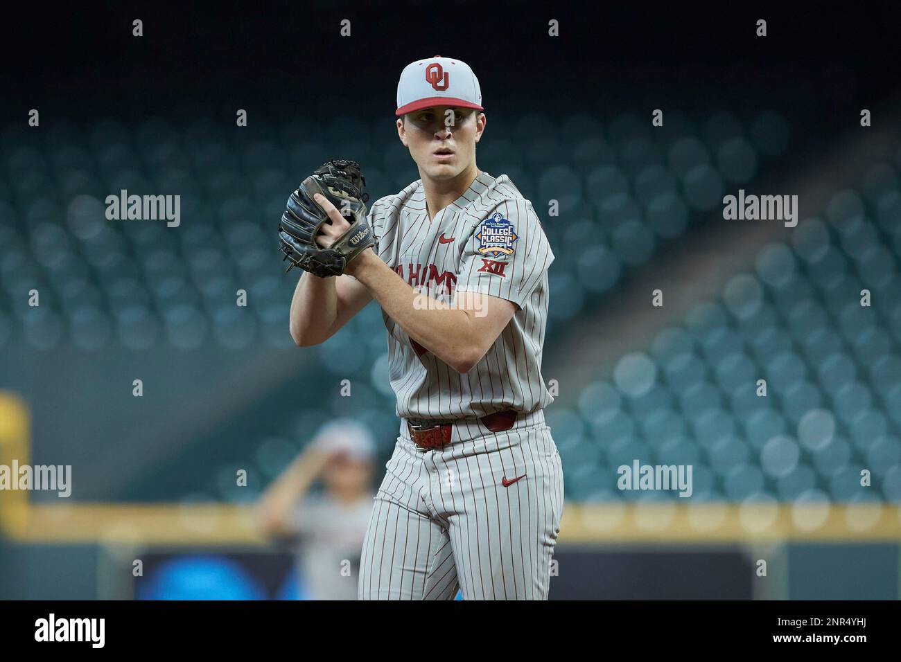 Oklahoma Sooners starting pitcher Dane Acker (28) looks to his catcher ...