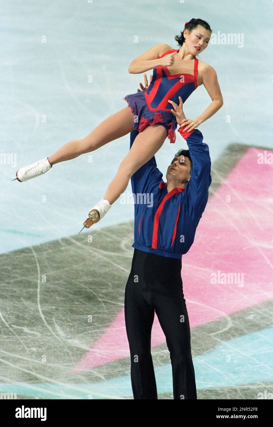 Pairs skaters Kyoko Ina (top) and Jason Dungjen compete in the free ...