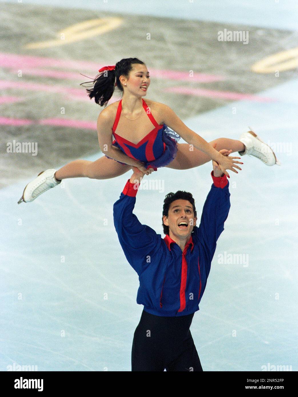 Pairs skaters Kyoko Ina (top) and Jason Dungjen compete in the free ...