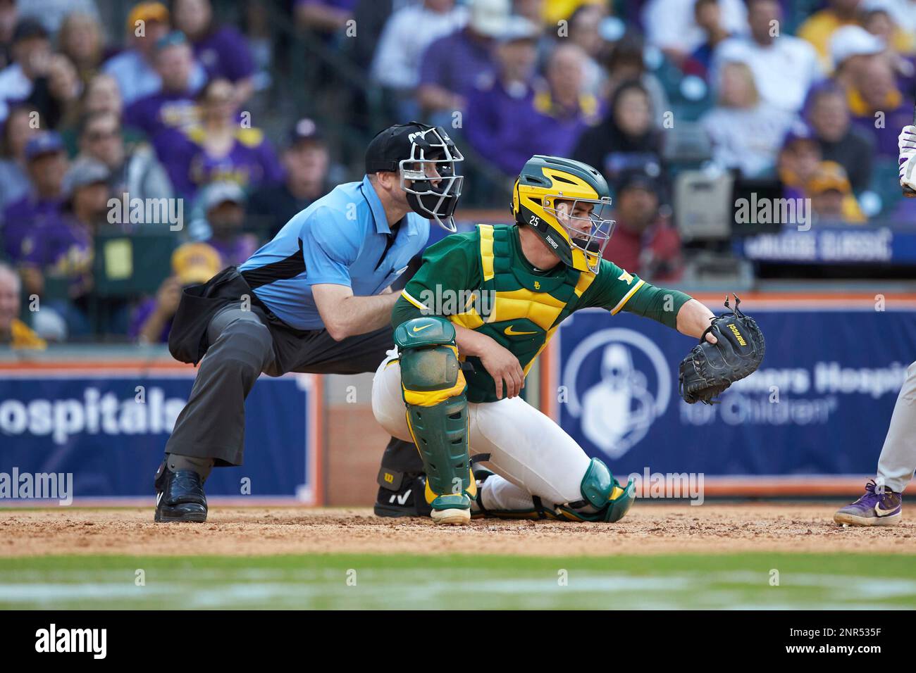 Baylor Bears catcher Andy Thomas (25) frames a pitch as home plate ...