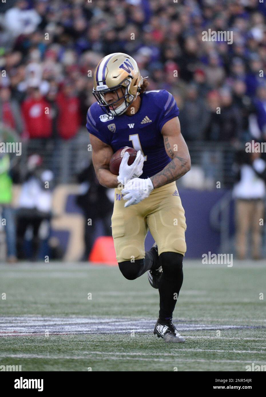 SEATTLE, WA - NOVEMBER 29: Washington tight end Hunter Bryant (1) picks ...