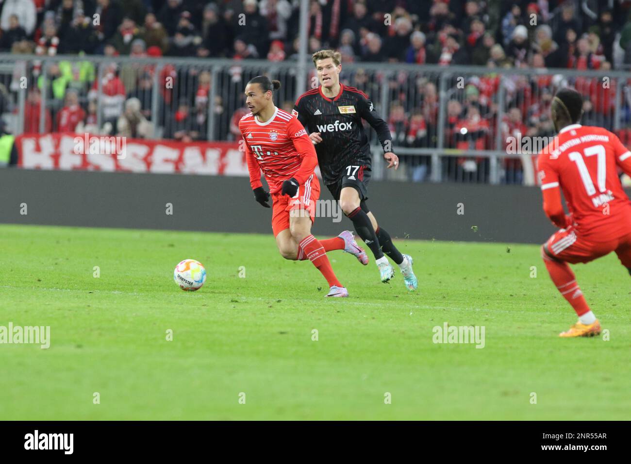 MUNICH, Germany. , . 10 Leroy Sané of FcBayern, 17 Kevin Behrens during ...