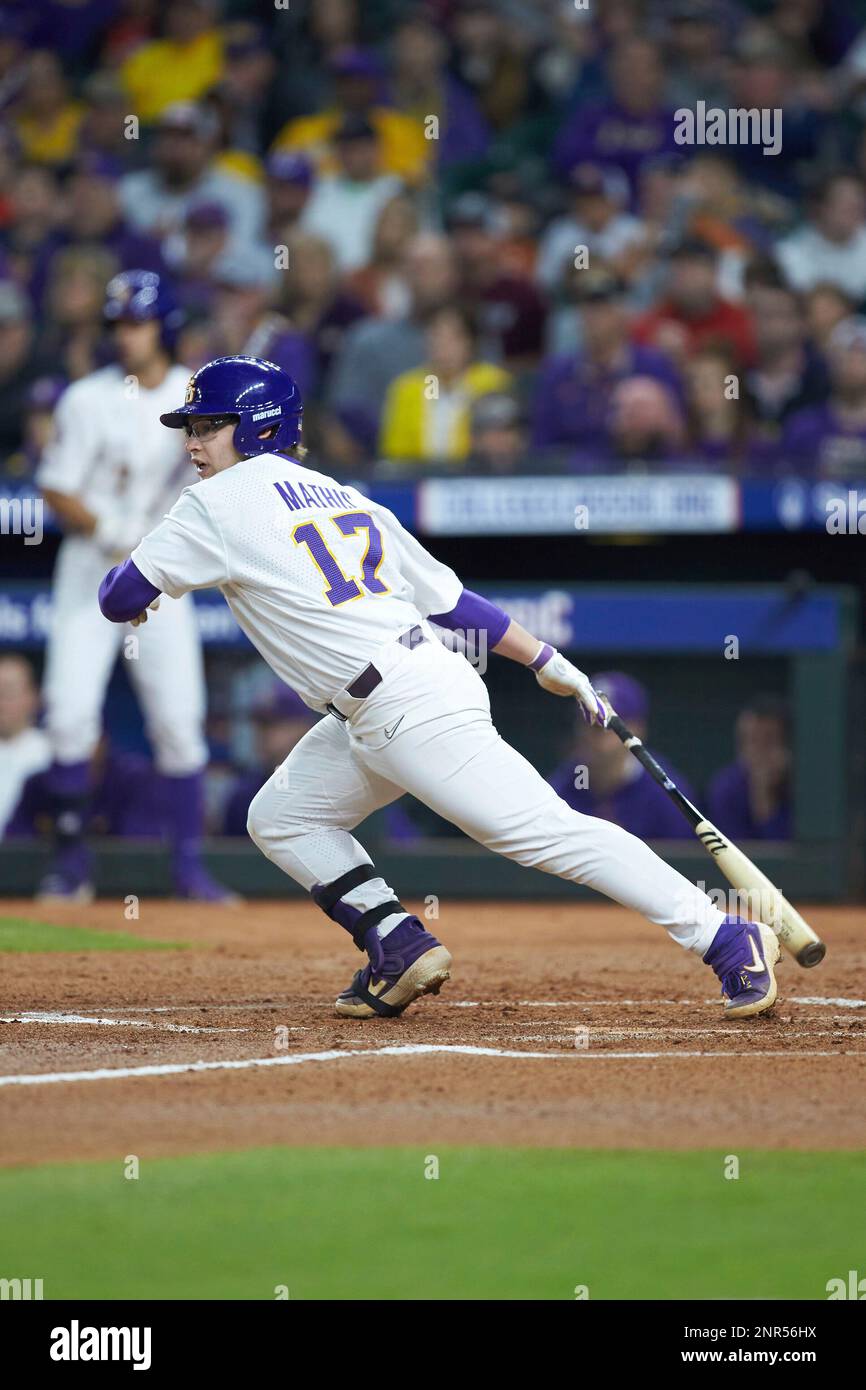Zack Mathis (17) of the LSU Tigers follows through on his swing against ...