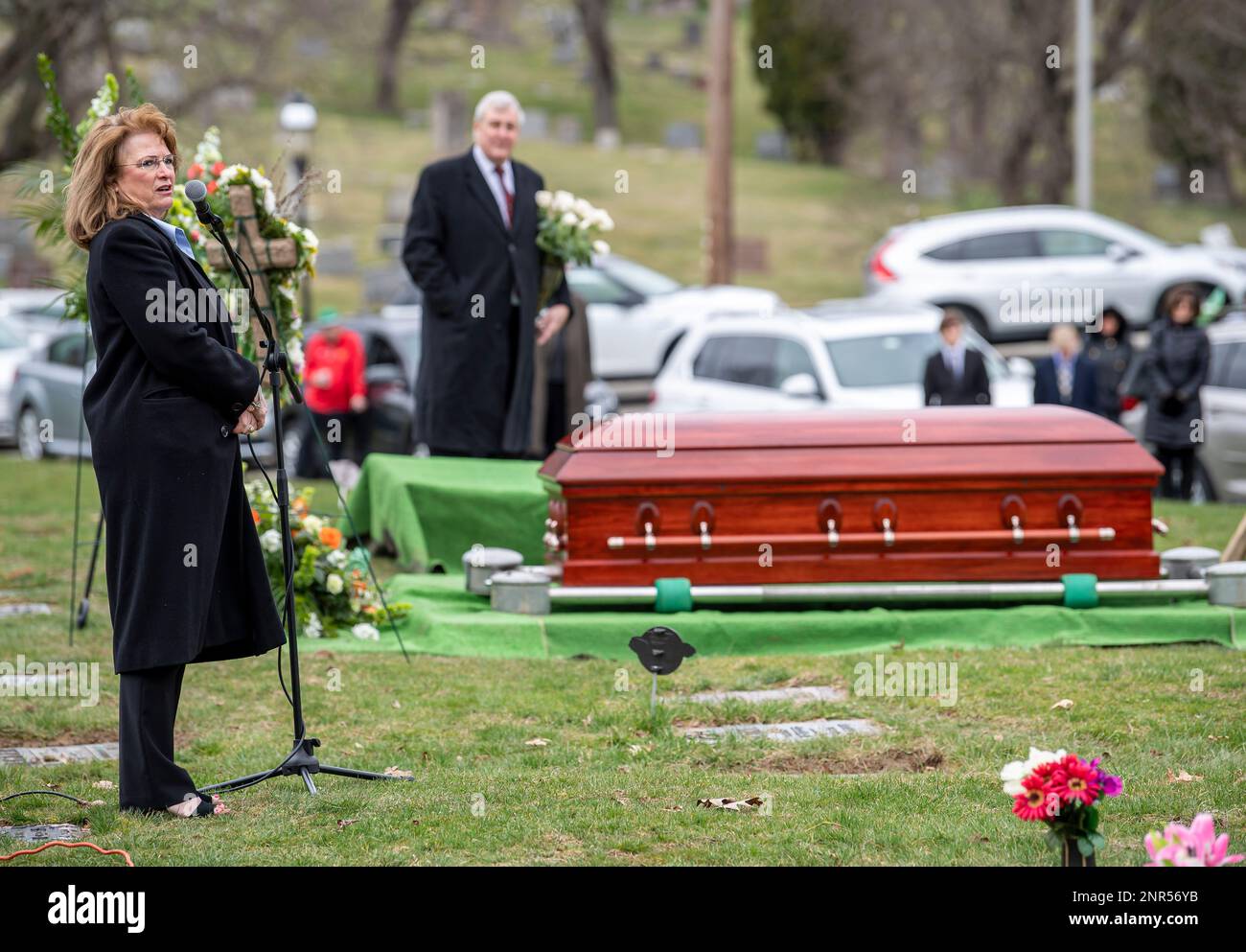 Terri McDermott speaks during the funeral of her husband Norbert Coyne ...