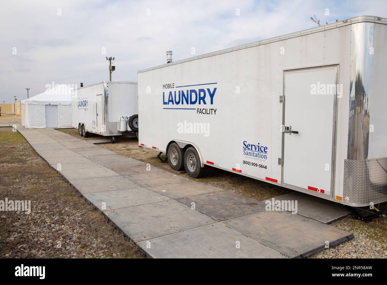This photo provided by the U.S. Army shows mobile laundry units and ...