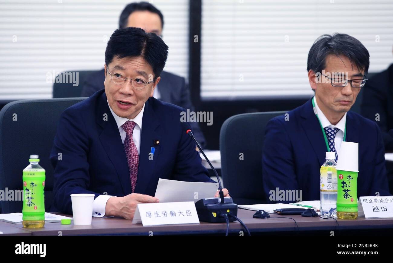 Japan's Health Minister Katsunobu Kato (L) attends a new coronavirus ...