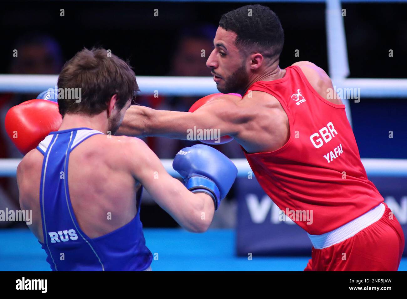 Galal Yafai of Great Britain, wearing Red and Rasul Saliev of Russia ...