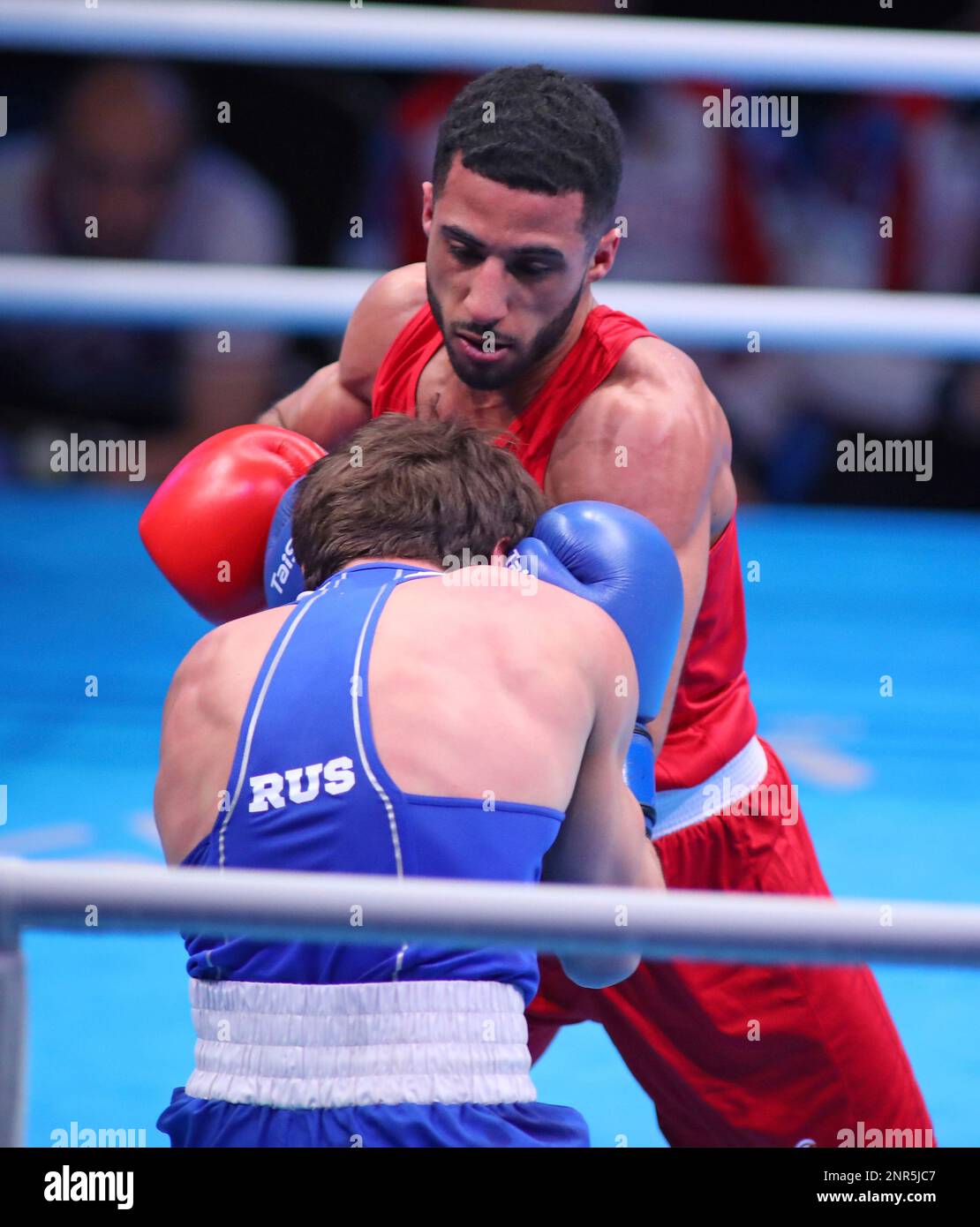 Galal Yafai of Great Britain, wearing Red and Rasul Saliev of Russia ...