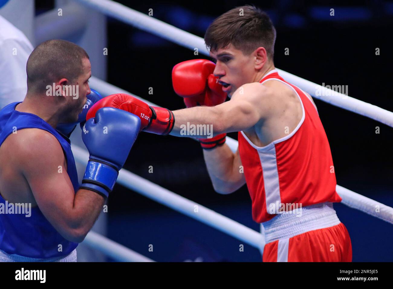 Gedminas Mindaugas of Norway, wearing Red and Imre Balazs Bacskai of ...