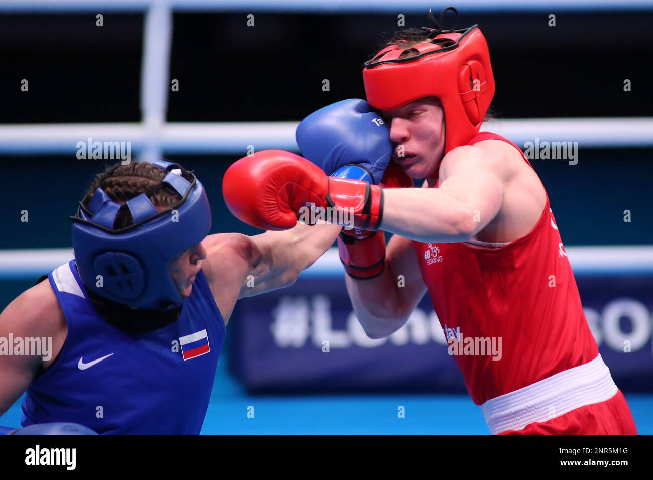 Rosie Eccles of Great Britain, wearing red and Saadat Dalgatova of ...