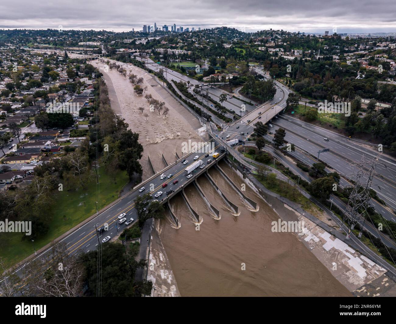 Drone view of a rain water swollen Los Angeles River in the Los Feliz ...