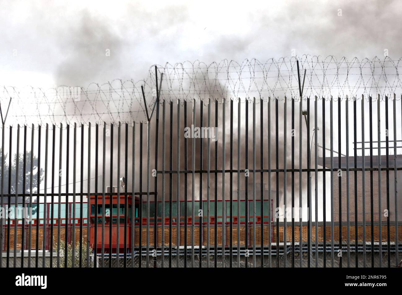 Smoke billows from Rebibbia prison following inmates' protests, in Rome ...