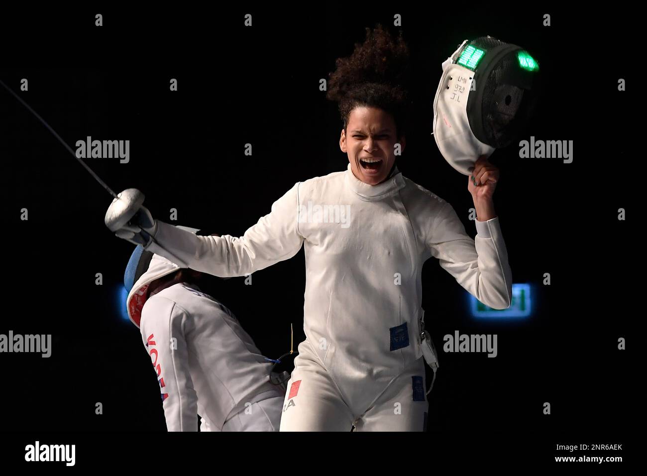 Alexandra Louis Marie, right, of France celebrates after she defeated ...