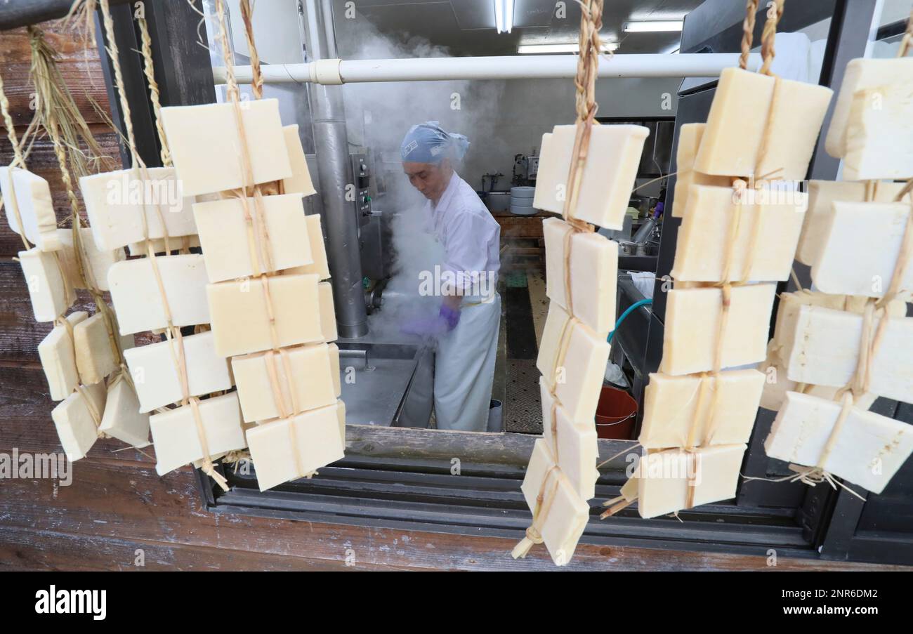Pieces of Shimi-Dofu are hung to be frozen and dried in Chino, Nagano ...