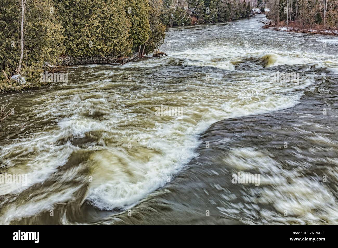 An unusual February thaw melts snow and ice and sends it thundering ...
