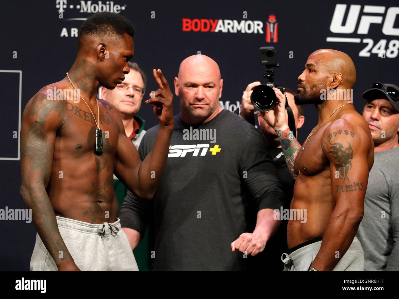 UFC middleweight champion Israel Adesanya, left, of Nigeria, and ...