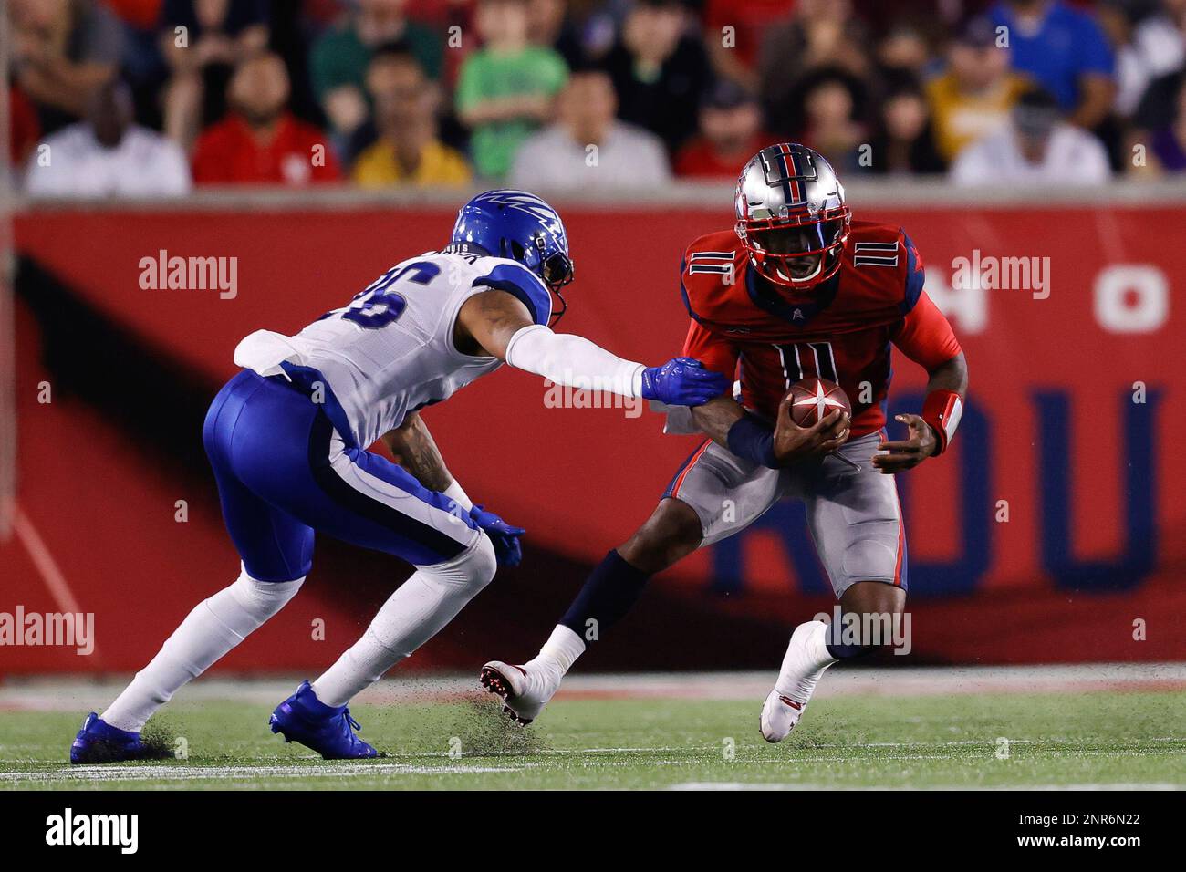 Houston Roughnecks quarterback P.J. Walker (11) scrambles during an XFL ...
