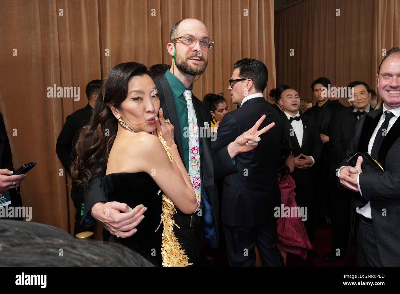 Michelle Yeoh, left, and Daniel Scheinert pose in the press room at the ...