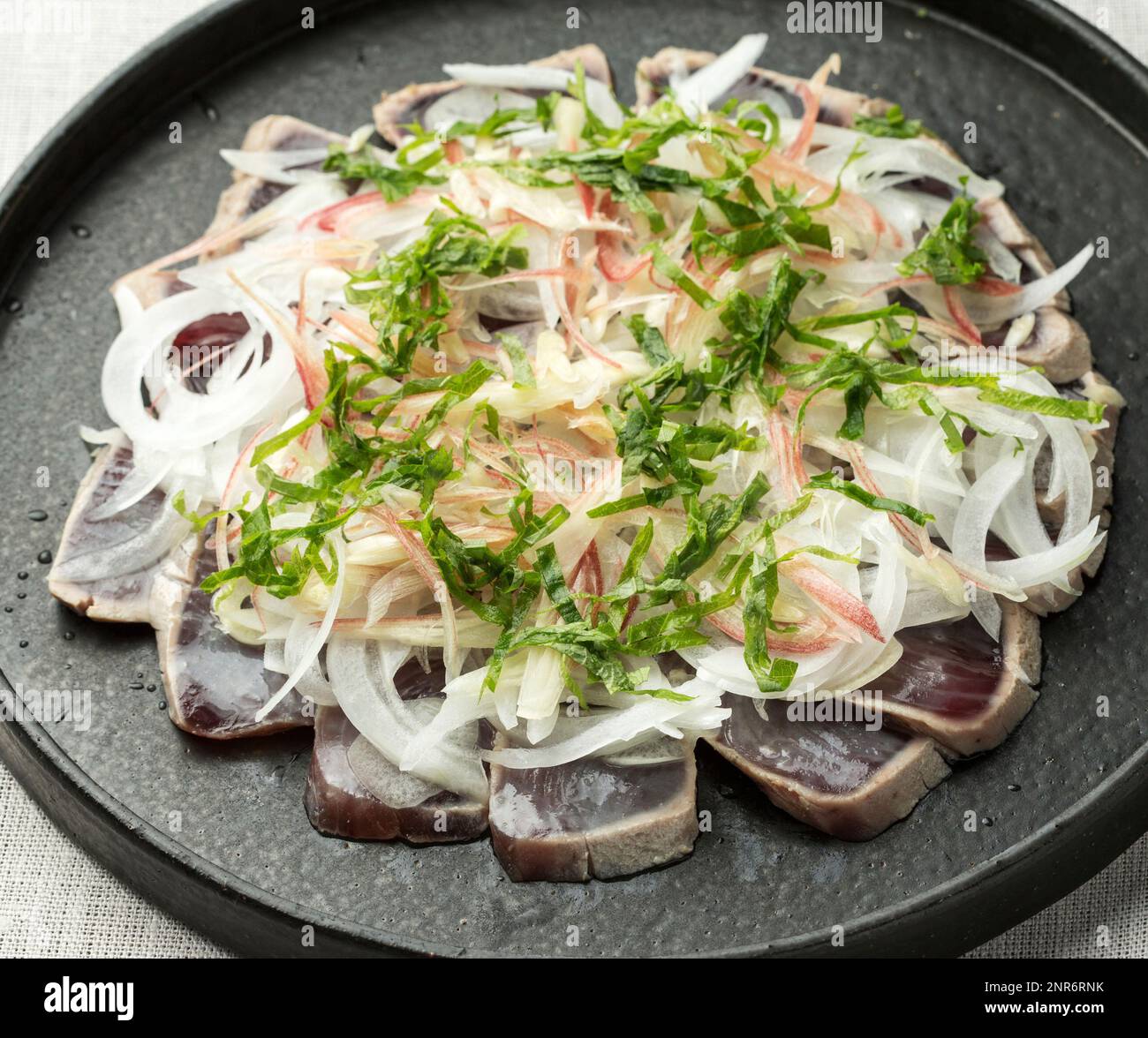 A picture taken on Feb 18, 2020 shows a Japanese dish, Katsuo-no-Tataki ...
