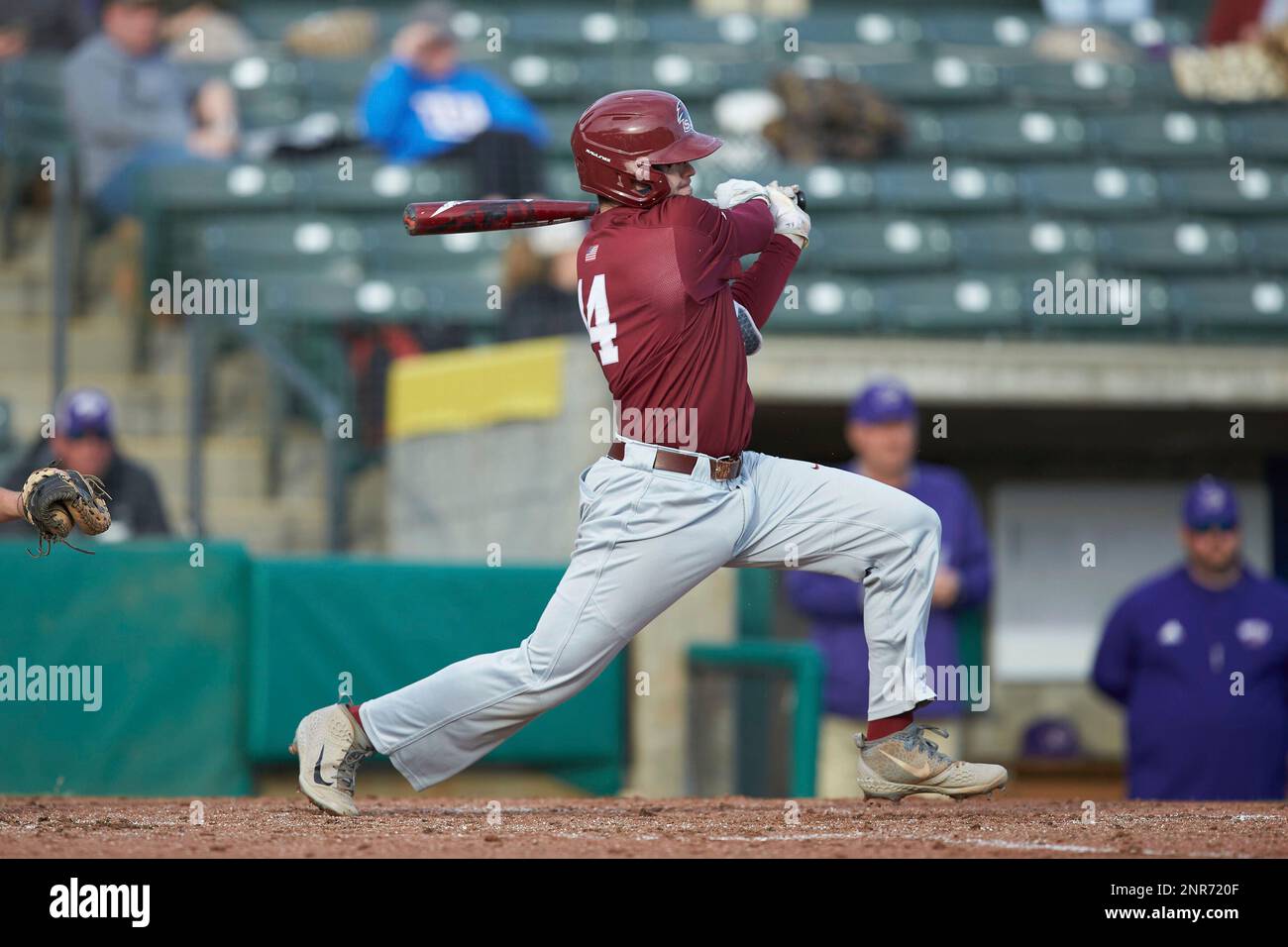 James McConnon (14) of the Saint Joseph's Hawks follows through on his ...