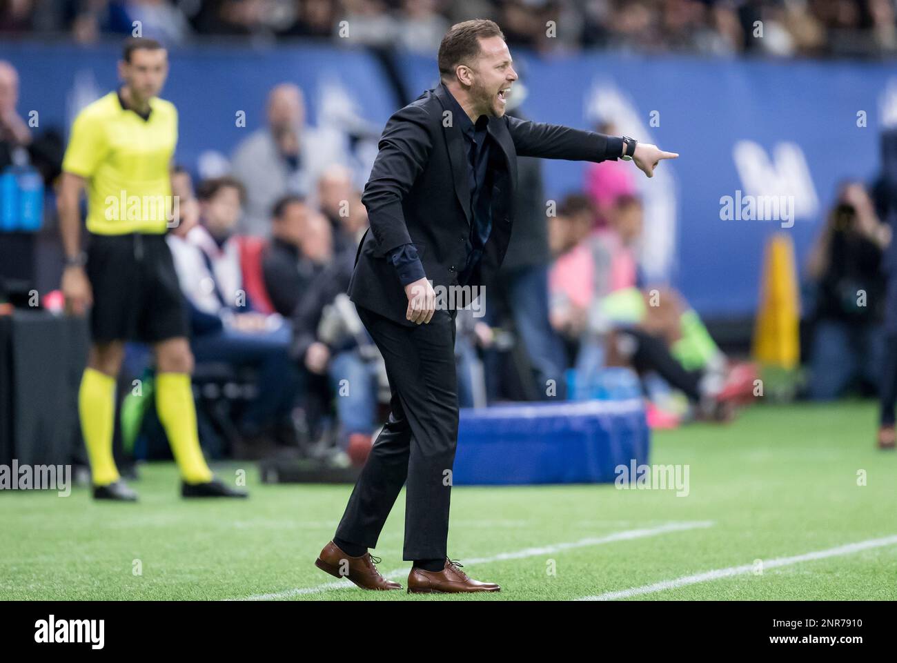 Vancouver Whitecaps coach Marc Dos Santos gestures and shouts during ...