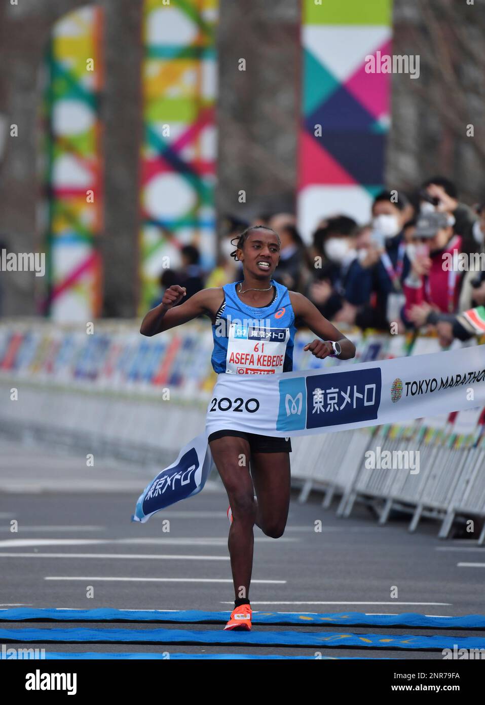 Sutume ASEFA KEBEDE crosses the finish line to place 3rd in the Women ...