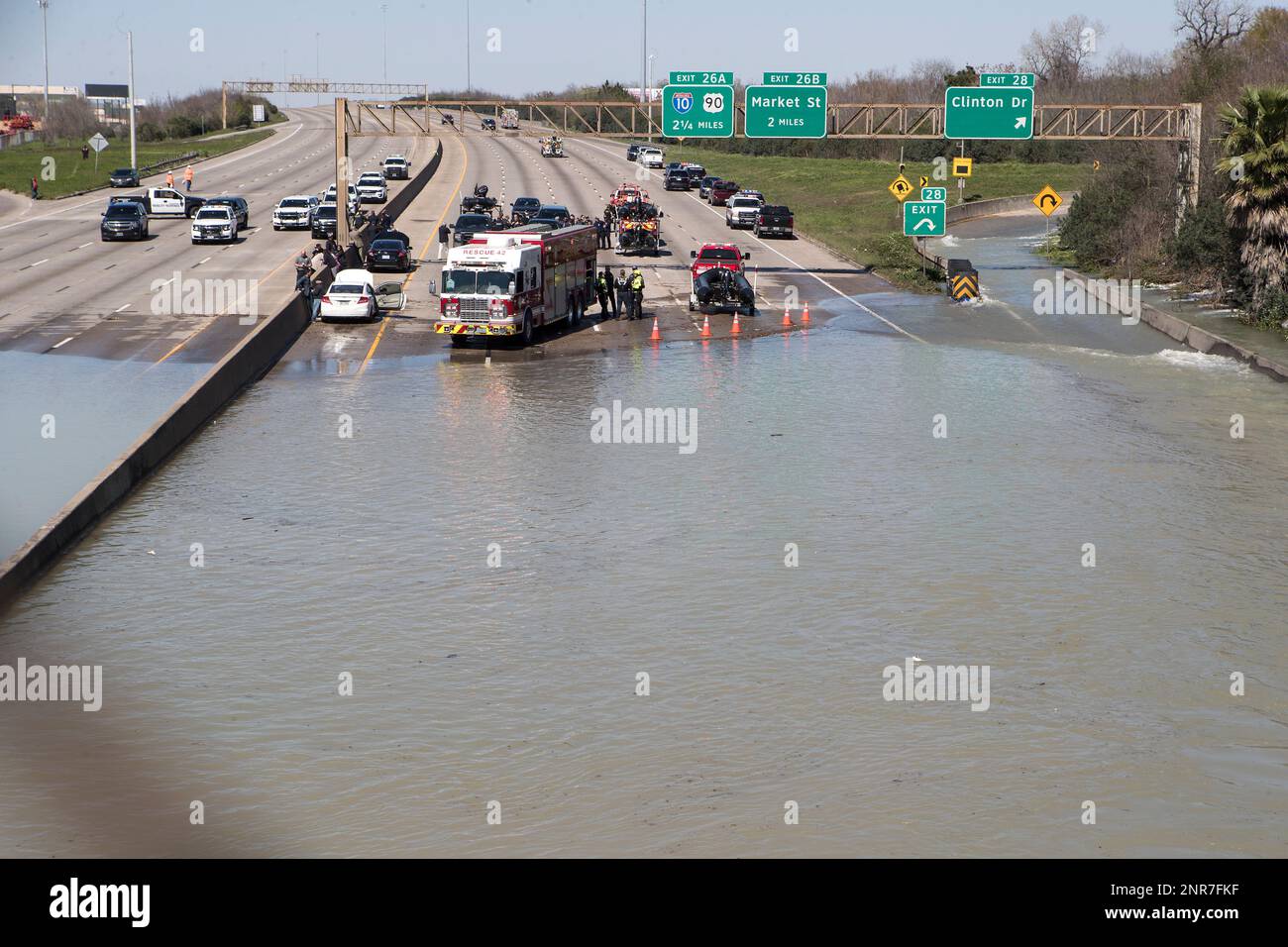 High water from a water main break floods the East Loop 610 on Thursday ...