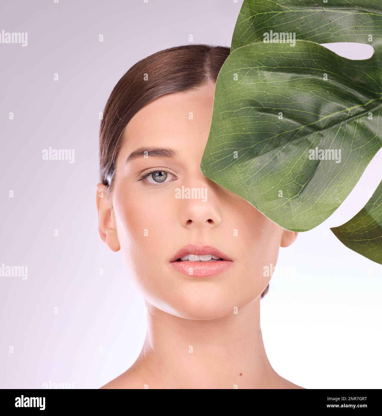 Woman, portrait and monstera leaf for beauty, natural cosmetics and ...